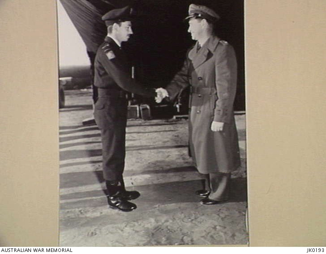 KIMPO, SOUTH KOREA. 1951-12-24. FLYING OFFICER KEN BLIGHT BEING ...