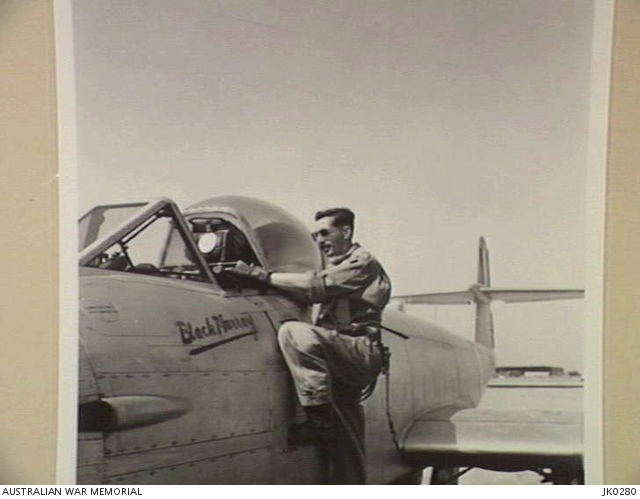 KIMPO, SOUTH KOREA. 1952. SERGEANT KEN MURRAY, STANDING BESIDE HIS ...
