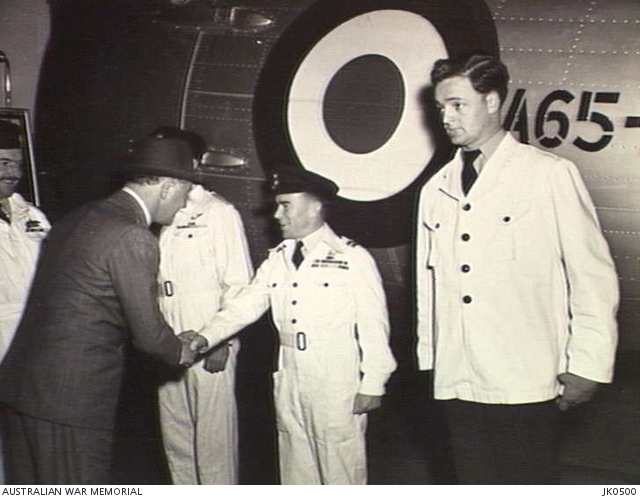 TOKYO, JAPAN. 1952-11-22. AFTER ARRIVAL AT IWAKUNI BY CIVIL AIRLINER ...