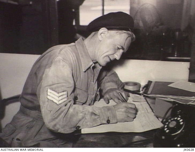 IWAKUNI, JAPAN. 1952. SERGEANT GEORGE MILLER IS SEEN HERE ENTERING UP ...