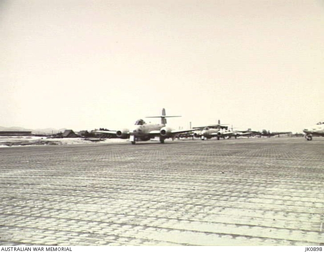 KIMPO, SOUTH KOREA. 1953. FULLY LOADED WITH HIGH EXPLOSIVE ROCKETS ...