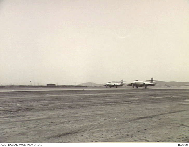 KIMPO, SOUTH KOREA. 1953. FULLY LOADED WITH HIGH EXPLOSIVE ROCKETS, TWO ...