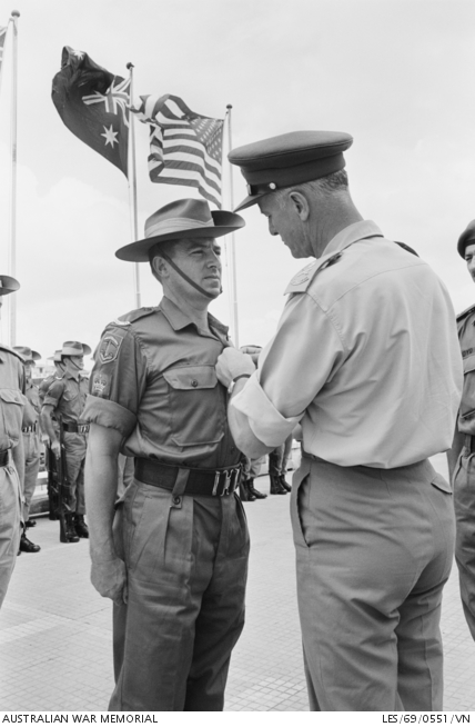 At a parade, Warrant Officer Class 2 (WO2) Bill Grogan of Plympton, SA ...