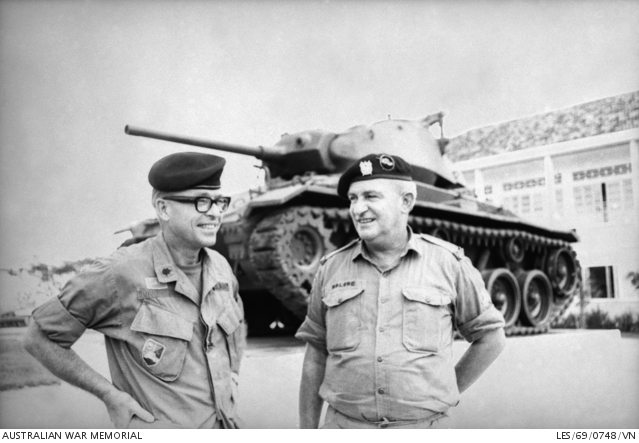 Warrant Officer Class 2 (WO2) Terry Malone of Canley Vale, NSW (right), of the Australian Army ...