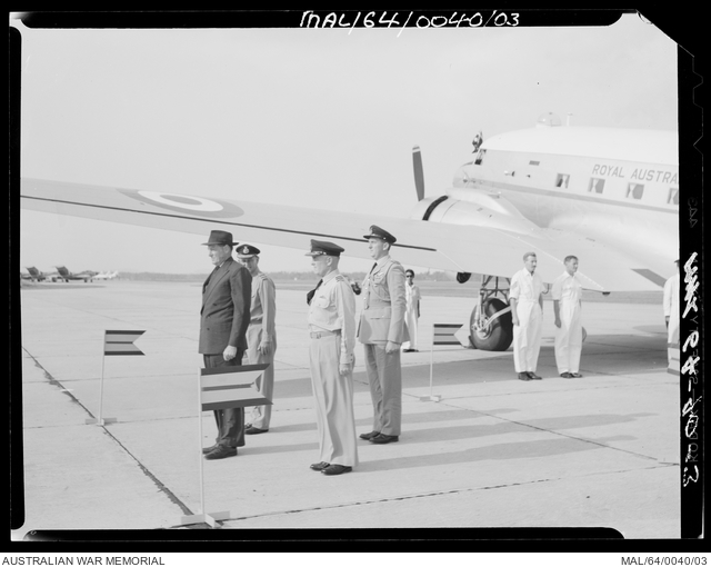 MR DAVID FAIRBAIRN TAKES THE SALUTE BY AN RAAF GUARD OF HONOUR AFTER ...
