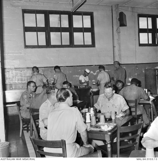 A group of RAAF Non Commissioned Officers' eat lunch in the base mess ...