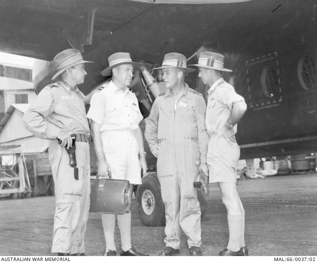 Senior RAAF officers at Vung Tau, South Vietnam discuss some of the ...