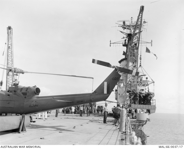Unloading RAAF helicopters from HMAS Sydney at Vung Tau, South Vietnam ...
