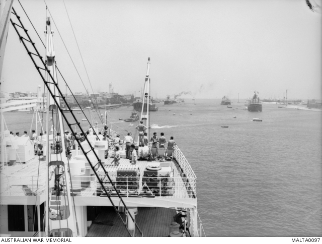 View of shipping at Port Said from on board SS Asturias as members of ...