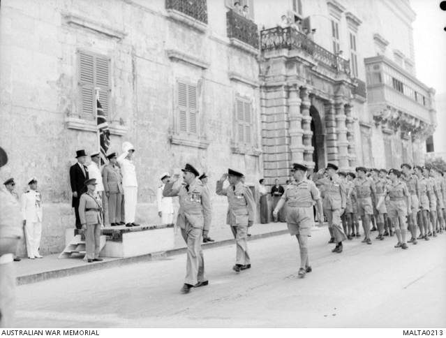 Sir Gerald Hallen Creasy, Governor of Malta, salutes from the dais ...