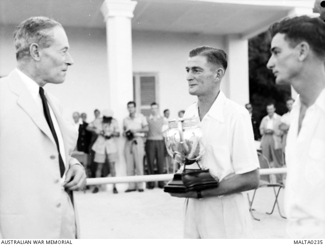 The Governor of Malta, Sir Gerald Hallen Creasy (left), congratulates ...