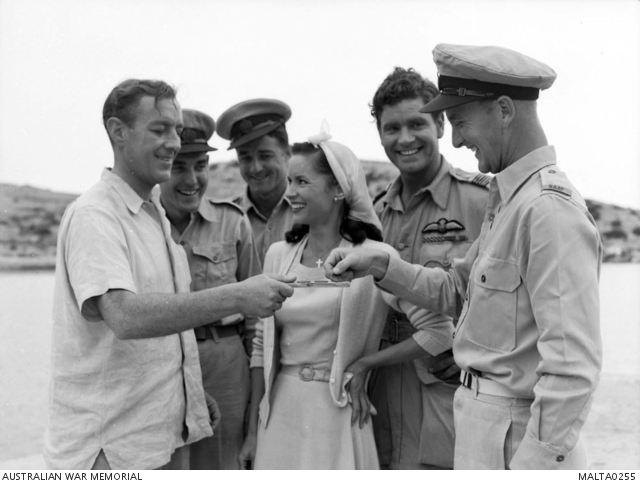 Three members of 78 Fighter Wing RAAF pictured on location with three ...