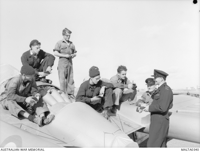 Members of 78 Fighter Wing RAAF receive Bibles from Chaplain Jim Payne ...