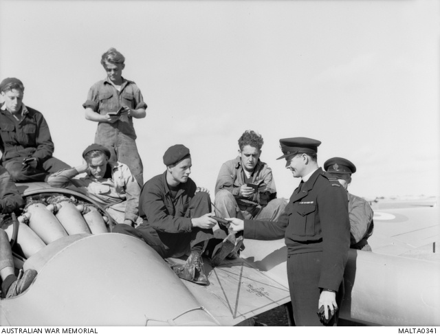 Members of 78 Fighter Wing RAAF receive Bibles from Chaplain Jim Payne ...