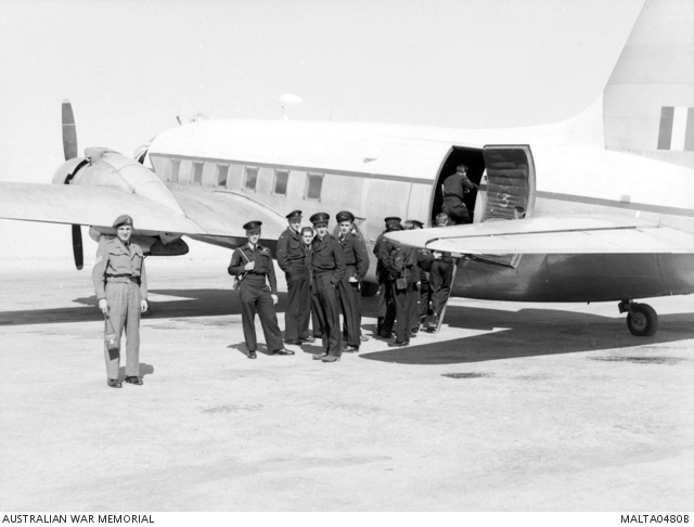 Members of 78 Fighter Wing RAAF waiting to board an RAF Transport ...