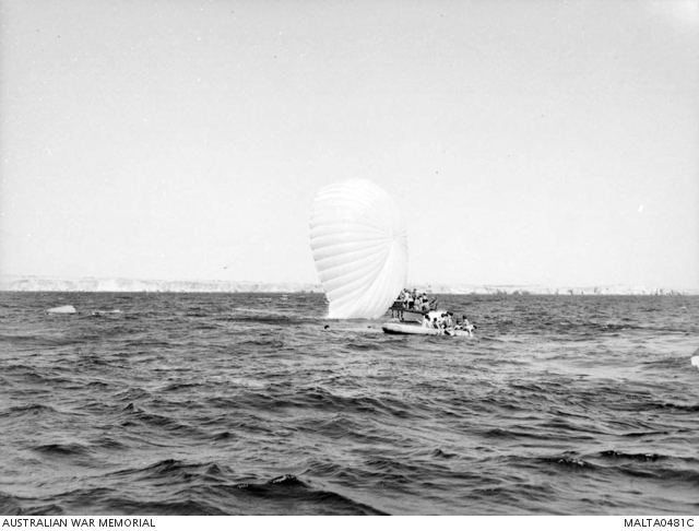 The parachute was attached to an airborne lifeboat that was dropped by ...
