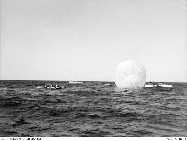 The parachute was attached to an airborne lifeboat that was dropped by ...