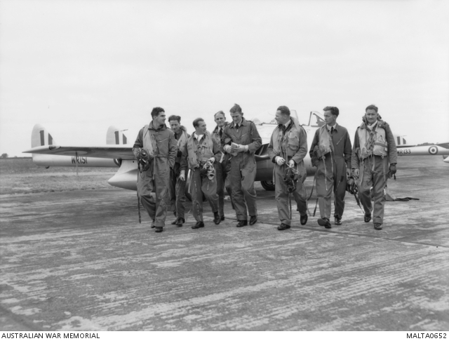 Pilots of 78 Fighter Wing RAAF return to the crewroom after a ...