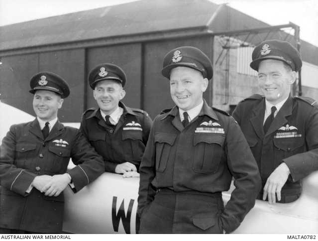 Group portrait of four pilots of 78 Fighter Wing RAAF who flew in the ...