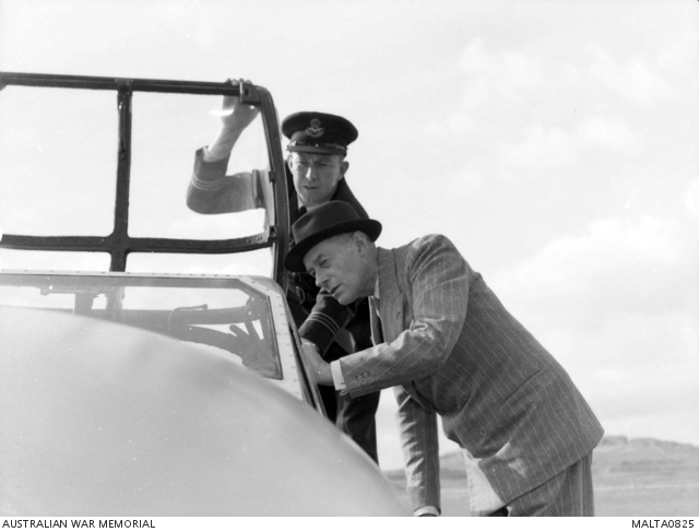 Sir Gerald Creasy, Governor of Malta, examines a Vampire Trainer ...