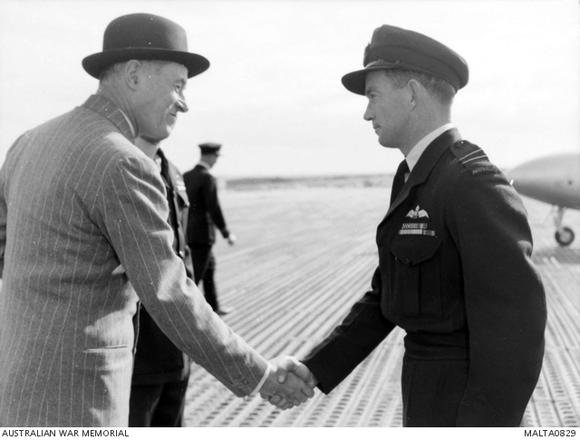 The Governor of Malta, Sir Gerald Creasy (left) shakes hands with ...