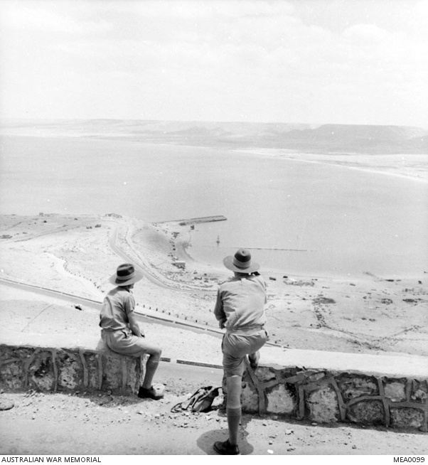 Sollum, Libya. Two RAAF airmen looking down on war batteries on the ...