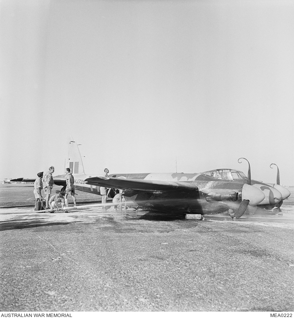 Malta. July 1943. Fire fighting crew dousing Mosquito aircraft (code YP ...