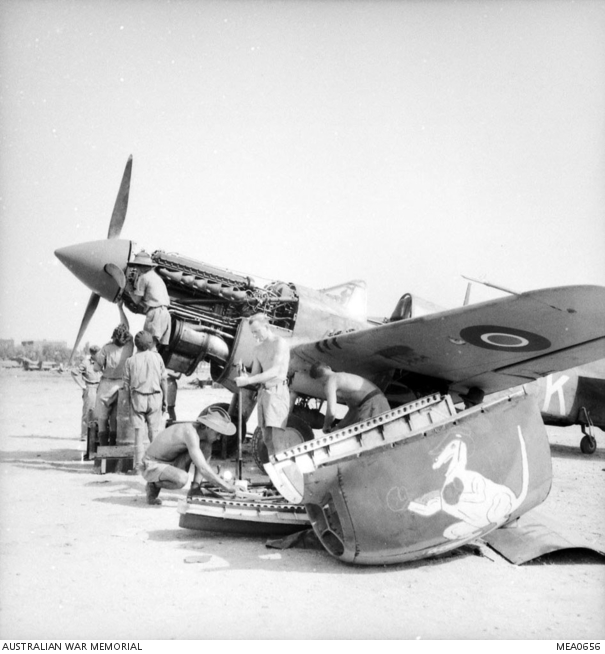 Ground crew personnel of No 450 Squadron (Sqn), RAAF, at work on a ...
