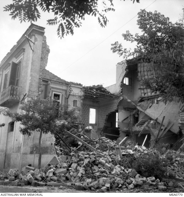 Foggia, Italy. c. September 1943. Bomb damaged building which felt the ...