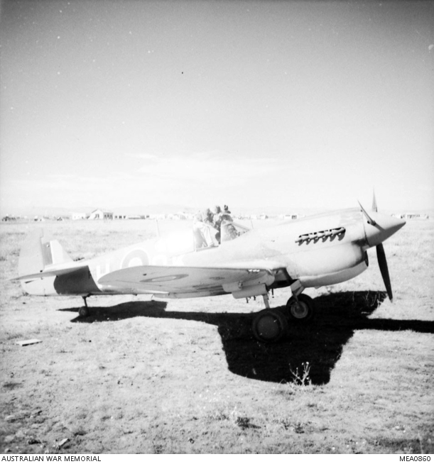 Foggia, Italy. 1943. A pilot of the Desert Harassers No. 450 (Kittyhawk ...