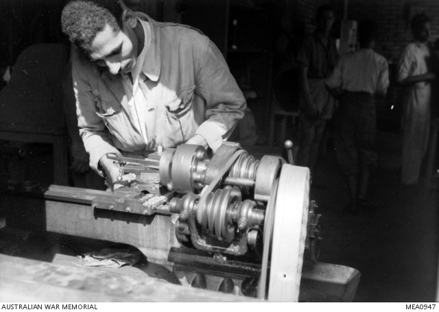 Heliopolis, Egypt. An Egyptian native at work in the shop of the ...