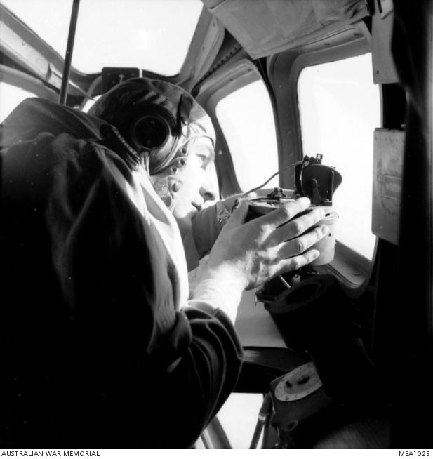 Western Desert, North Africa. c. 1943. Prior to take off Flying Officer ...