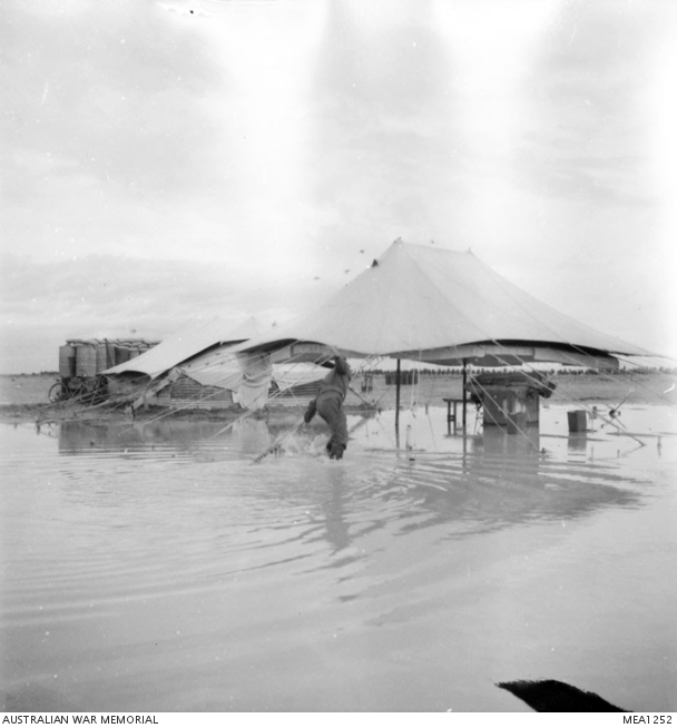 Western Desert. c. 1943. Water covers an airfield after a heavy rain ...