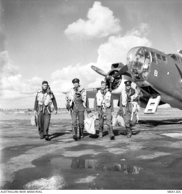 Western Desert. c. 1943. Squadron Leader D. C. Beaton DFC and his crew ...