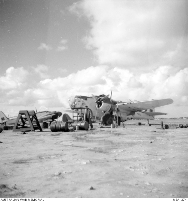 Western Desert. c. 1943. Maintenance section carrying out work on a ...