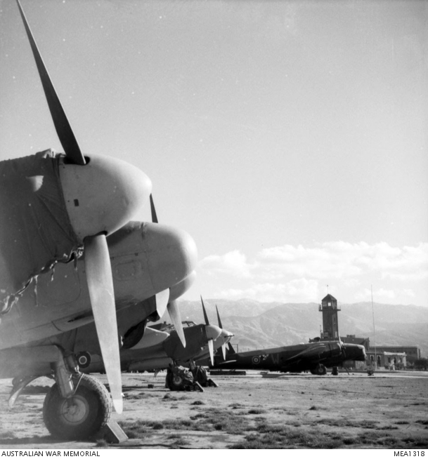 Algeria. c. 1943. A line up of aircraft on Blida airfield. To the left ...