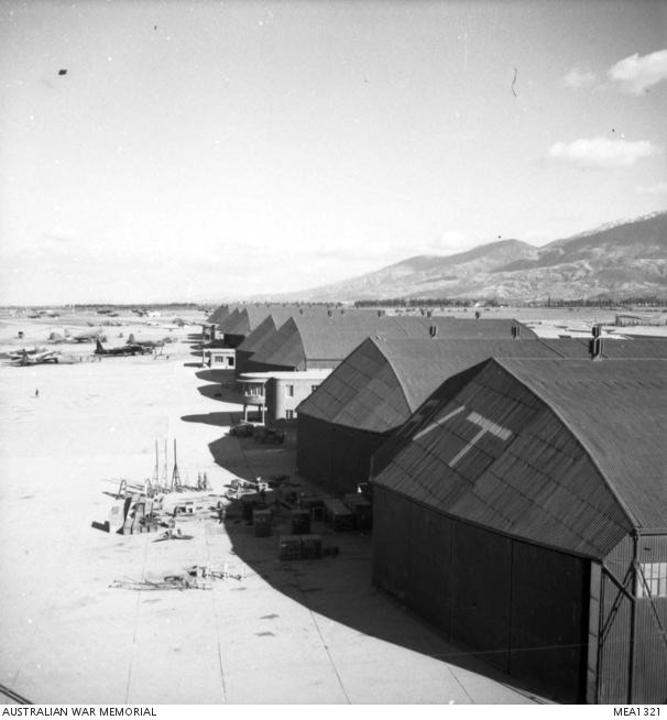 Algeria. c. 1943. Exterior of the hangars and aircraft on the tarmac at ...