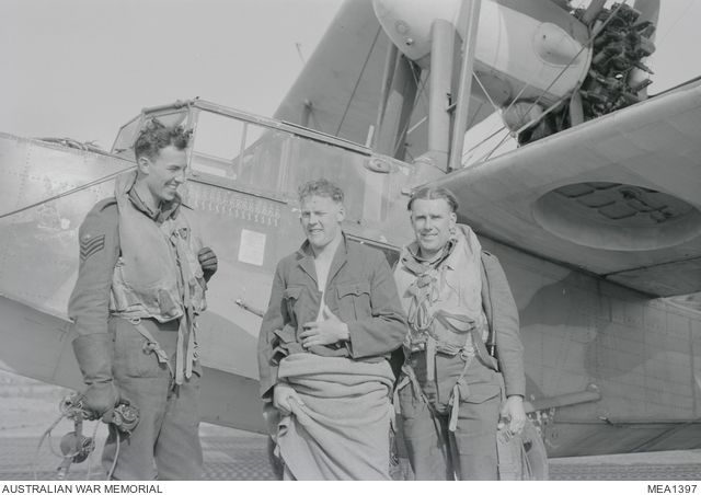 Italy. c. April 1944. Flight Sergeant (Flt Sgt) E. J. Holmes DFM of Essex, England, and Wireless ...