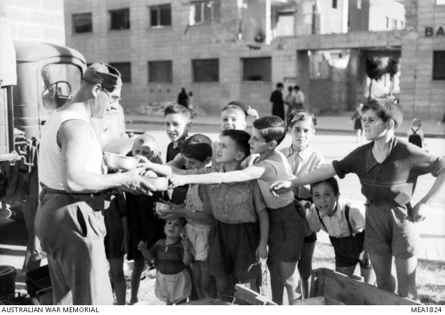 Italy. c. June 1944. Italian children living in a bombed village north ...