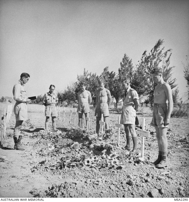 Argenta Gap Cemetery, Italy. c. 1945. Padre Fred McKay conducts a ...