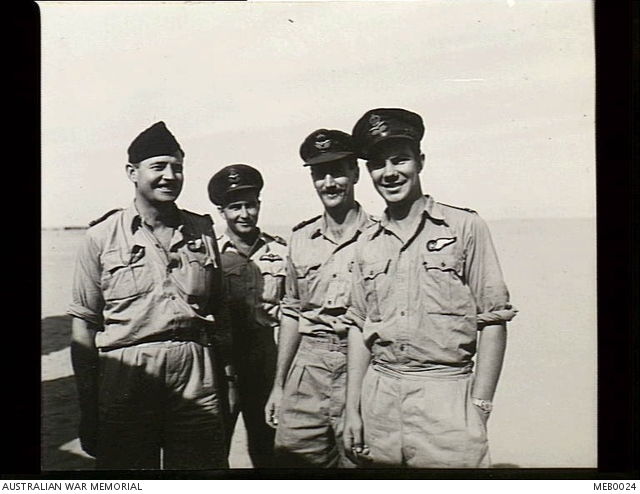 Middle East. c. August 1943. Group portrait of three RAAF and one RNZAF ...