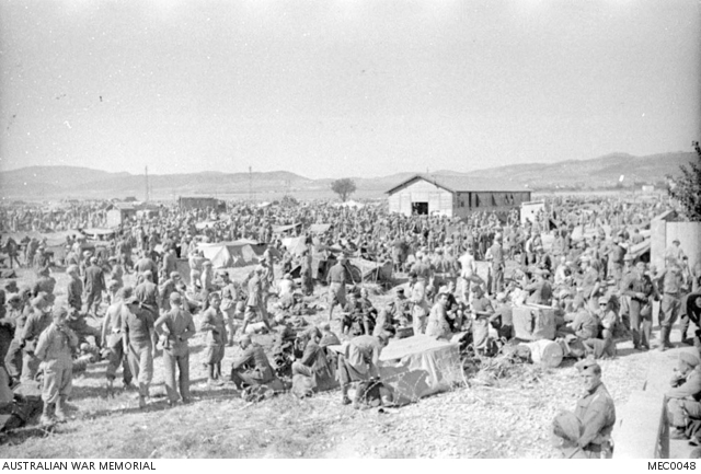 Tunis, Tunisia. c. 7 May 1943. Thousands of Axis troops are gathered ...
