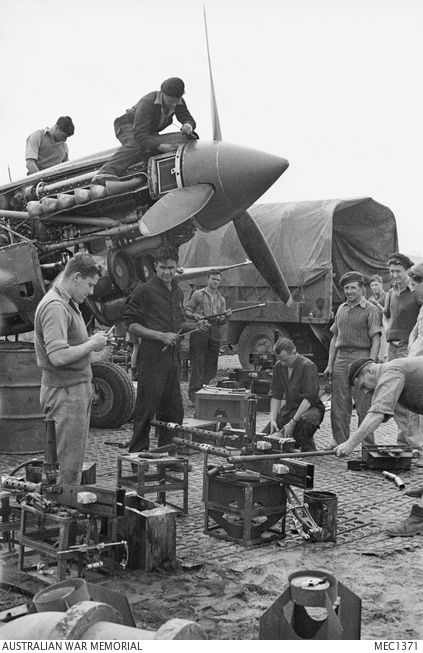 Cutella, Italy. April 1944. Armourers and fitters of No. 450 Squadron ...
