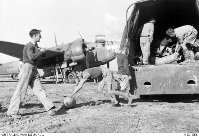 Falconara, Italy. c. November 1944. Ground crew members of No. 454 ...