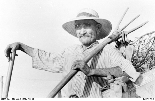 Pachino, Sicily, Italy. c. July 1943. Informal portrait of a peasant ...