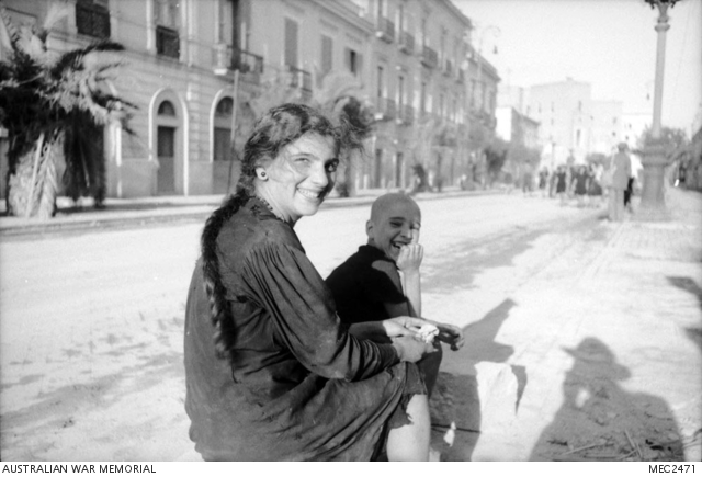 Foggia, Italy. October 1943. The happy face of one of the locals who ...