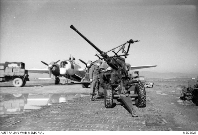 Bone, Algeria. c. 1943. Members of an ack-ack gun at an airfield used ...