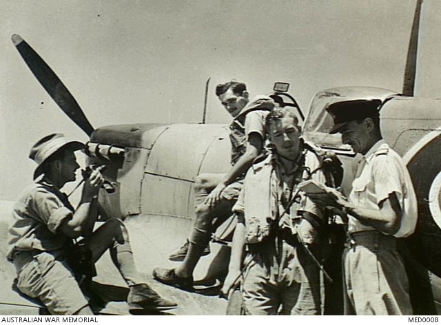 RAAF Spitfire aircraft pilots, relating their experiences and having ...