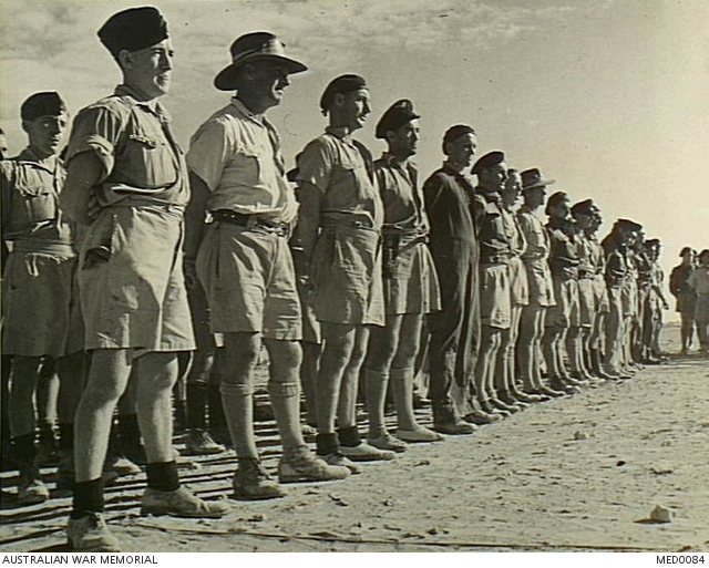 Sidi Barrani, North Africa. c. November 1941. Pilots and ground staff ...
