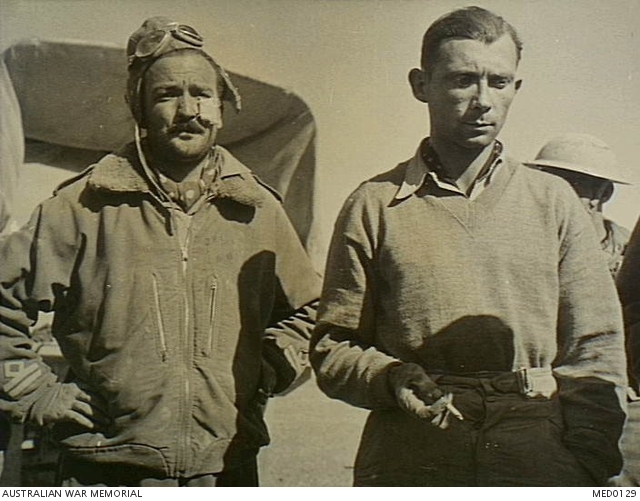 Western Desert, North Africa. 26 November 1941. Italian (left) and ...